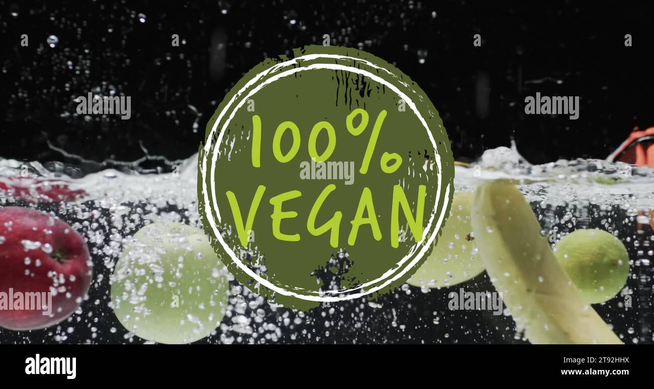 Composite of 100 percent vegan text over fresh fruit in water with copy ...