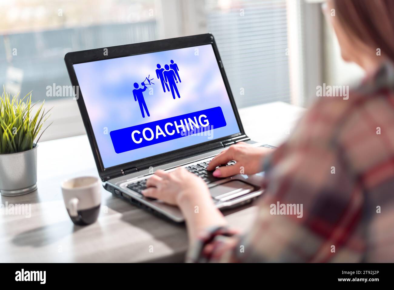 Laptop screen displaying a coaching concept Stock Photo - Alamy