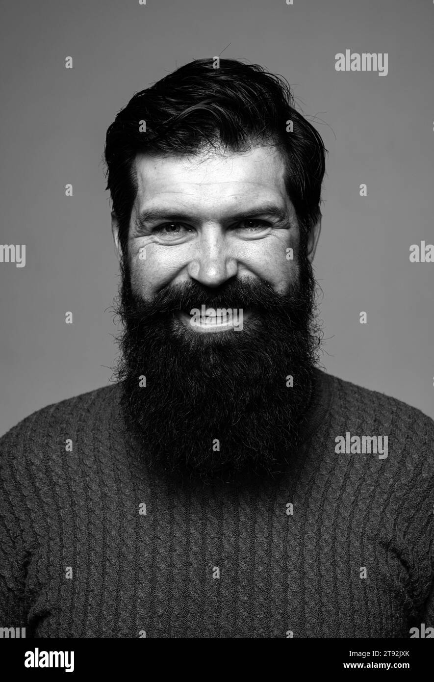 Happy man smile face. Handsome smiling young guy. Barber with long ... Happy man smile face. Handsome smiling young guy. Barber with long ...
