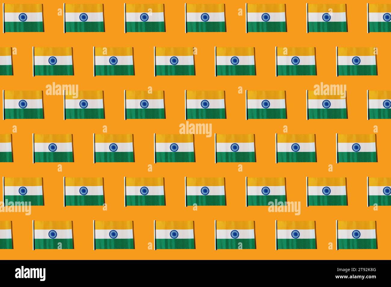 Pattern of flags of the Republic of India on orange background. Concept ...