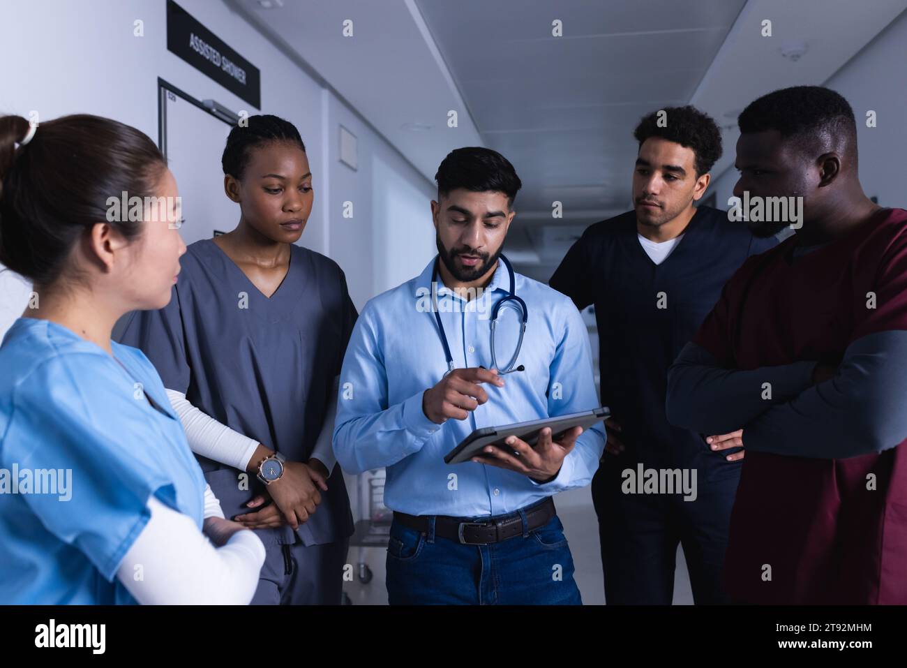 Diverse female doctors using tablet hi-res stock photography and images ...