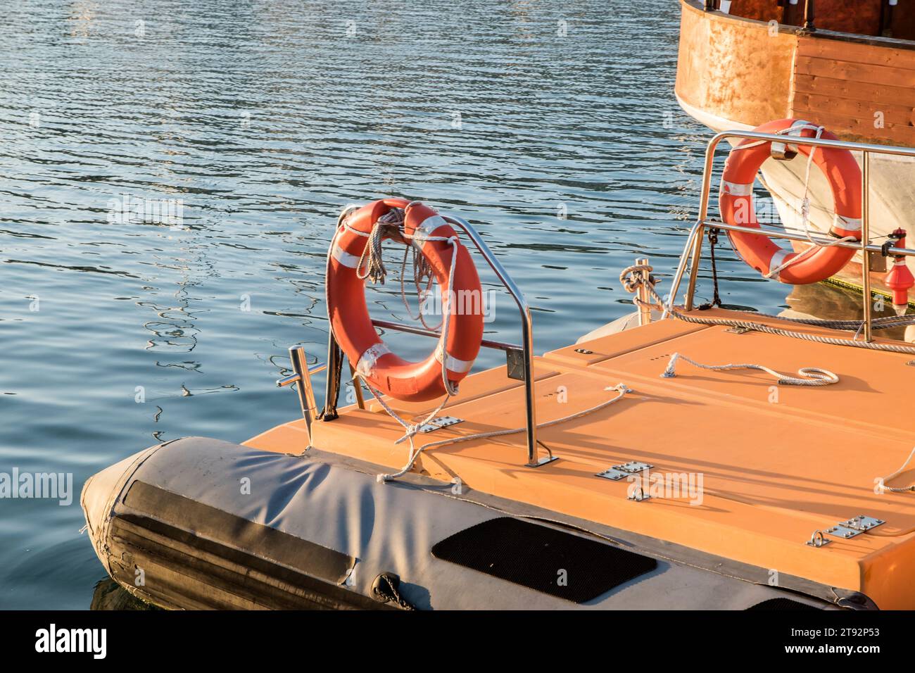 Rear part of inflatable lifeguard rescue boat closeup on calm waters ...