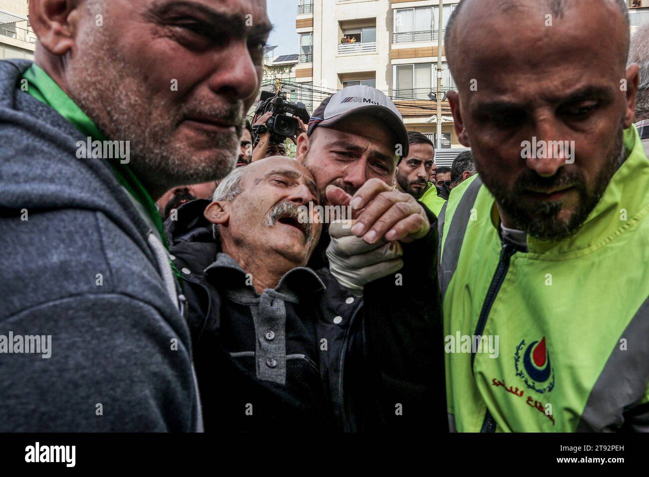Beirut, Lebanon. 22nd Nov, 2023. Mourners carry the father of cameraman ...