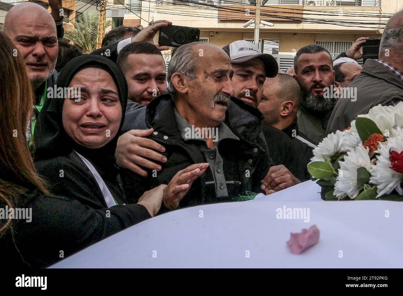 Beirut, Lebanon. 22nd Nov, 2023. Father (C) and sister of cameraman ...