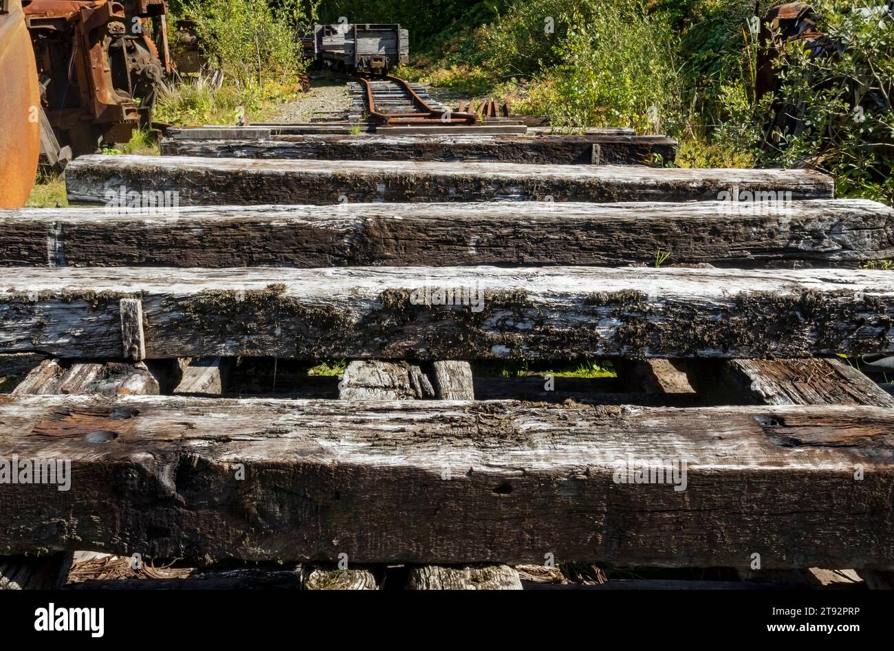 Stack stacked pile of old weathered wooden timber rail railway railroad ...
