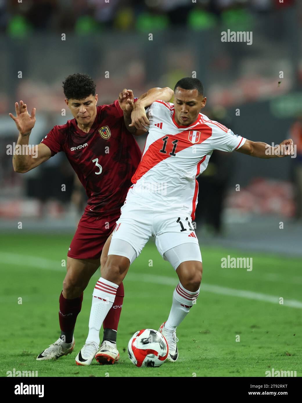 Lima, Peru. 21st Nov, 2023. Bryan Reyna of Peru and Yordan Osorio of ...