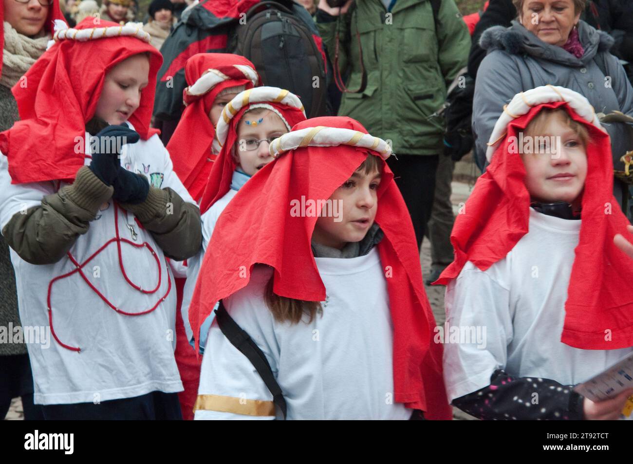 Children wearing Palestinian headdress, singing Christmas carols ...