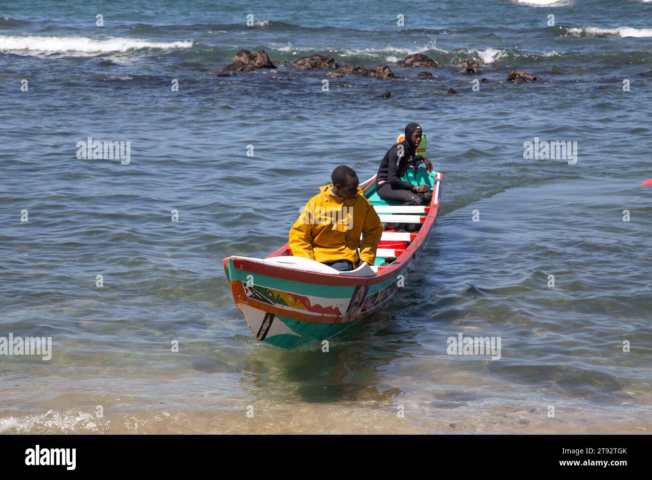 Dakar, Senegal. August 18, 2019: Fishermen with a fishing boat in a ...