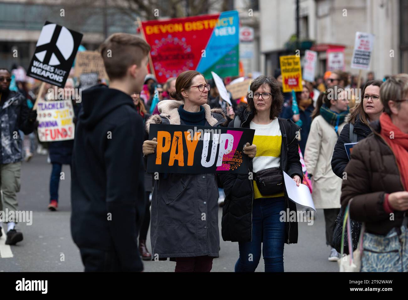 Placards are held during a march and rally called by the NEU (National ...