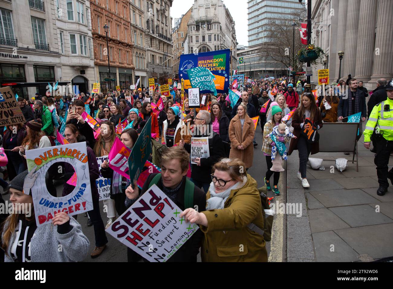 Placards are held during a march and rally called by the NEU (National ...