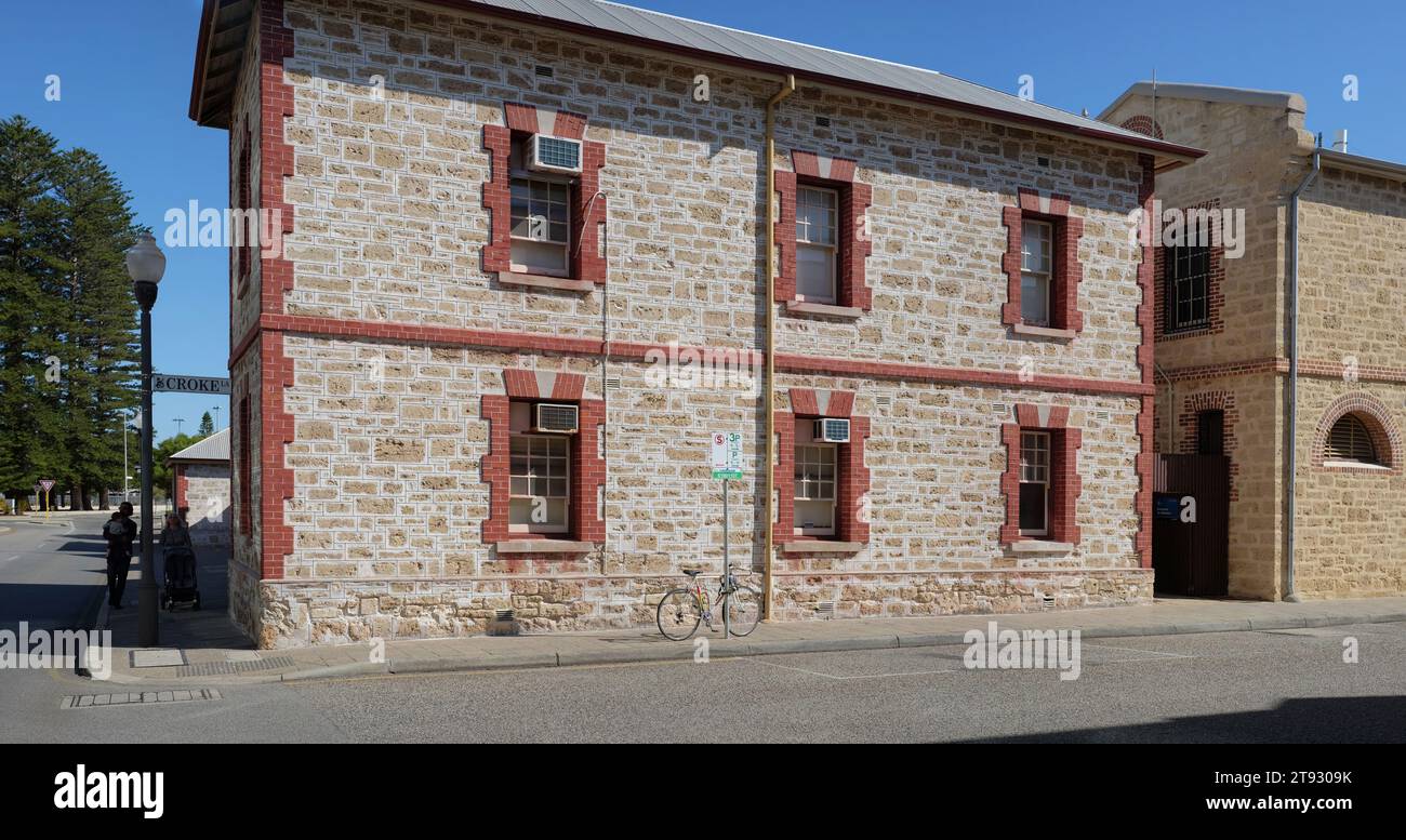 A two story stone warehouse building (1903) in Victorian Georgian style ...