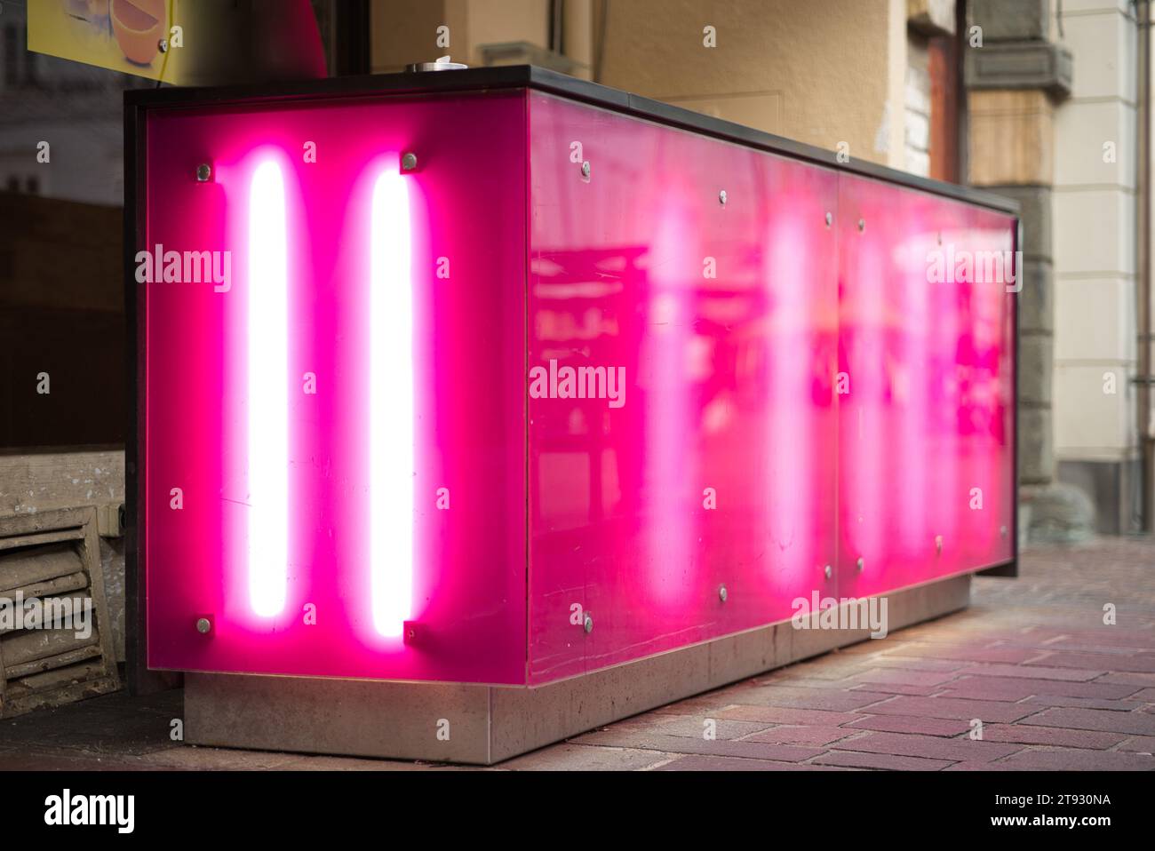 Explore the vibrant ambiance of an outdoor bar counter with pink ...