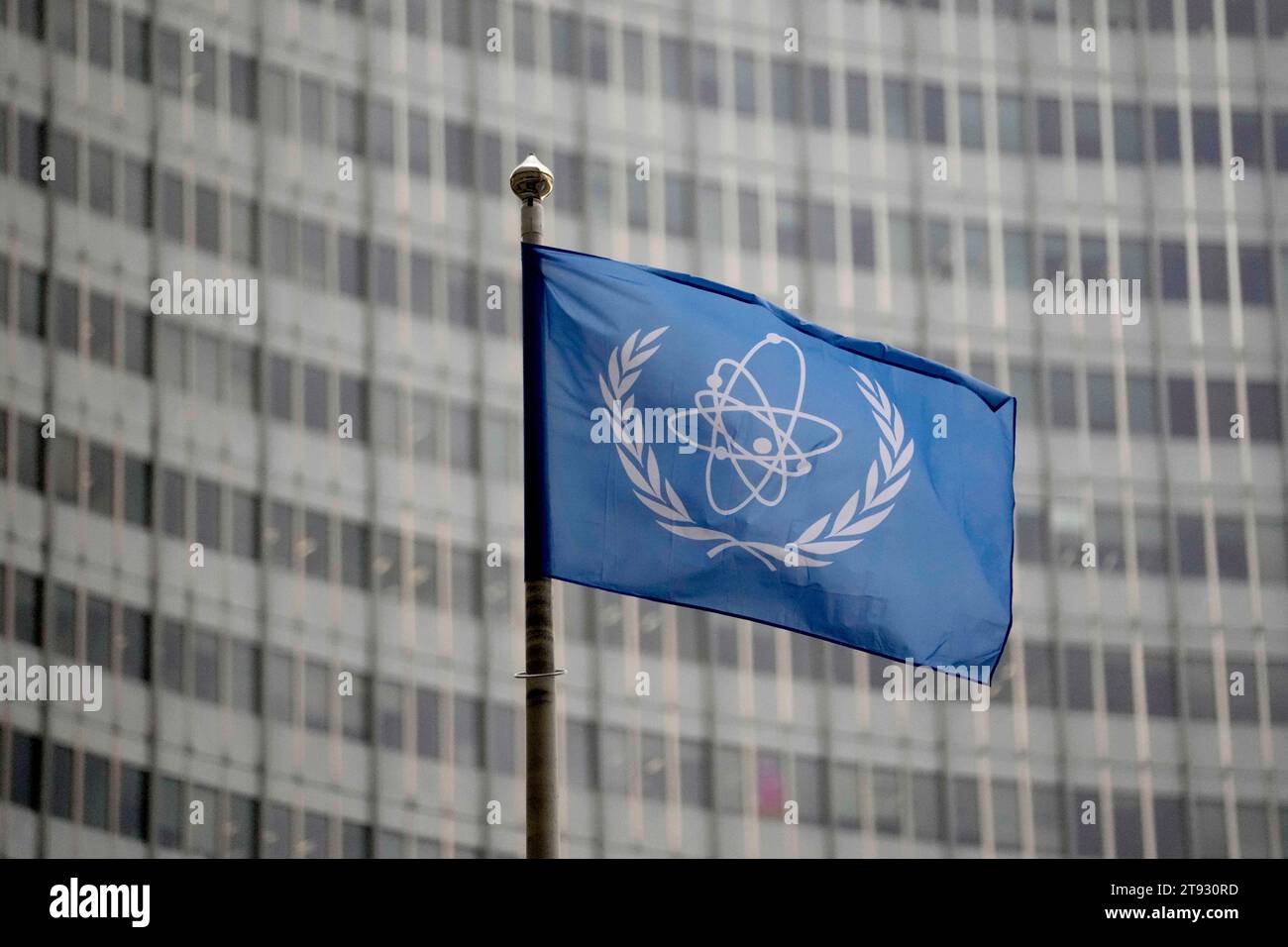 The flag of the International Atomic Energy Agency flies in front of ...