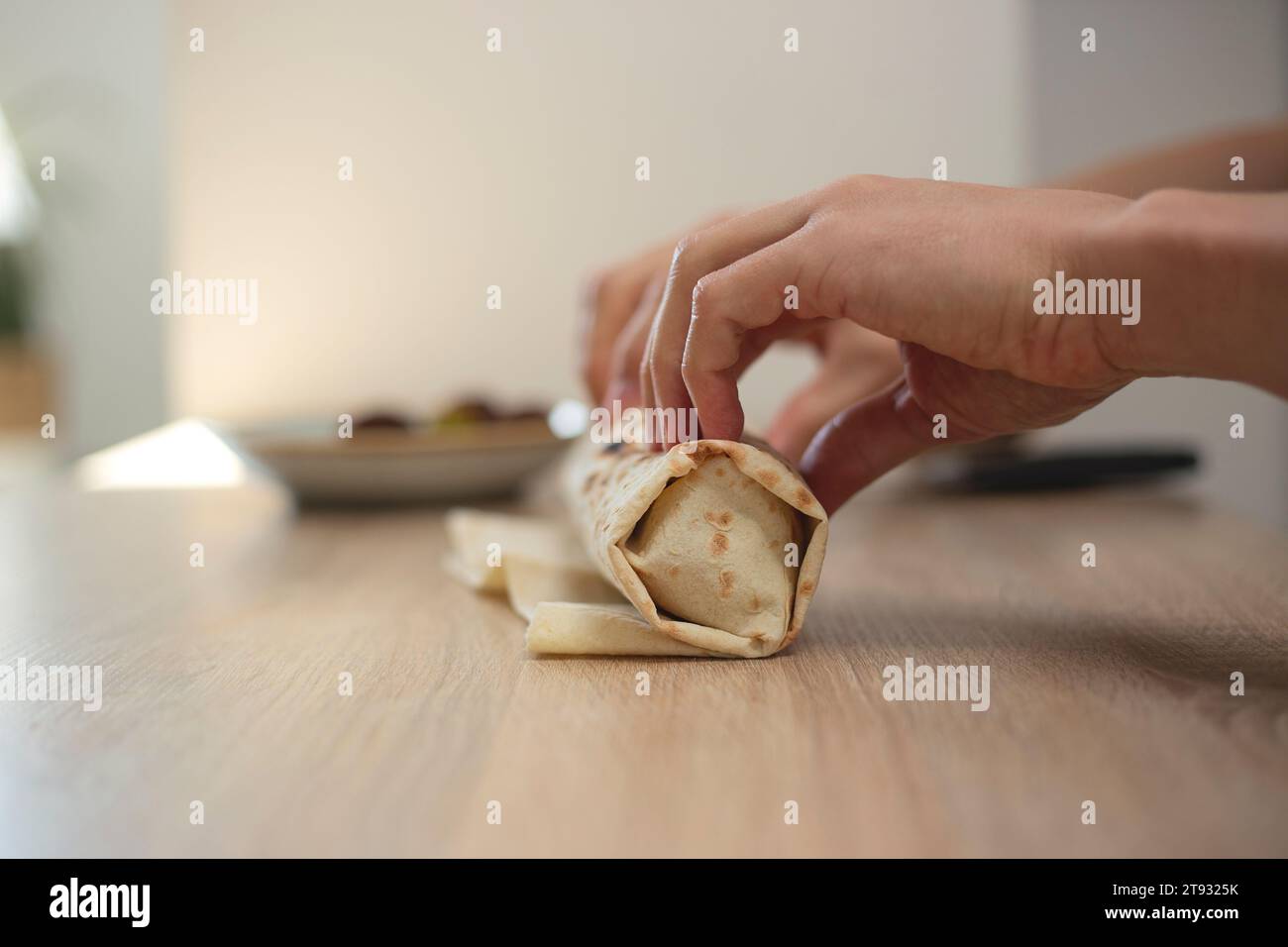 Man cooking homemade falafel in pita Stock Photo - Alamy