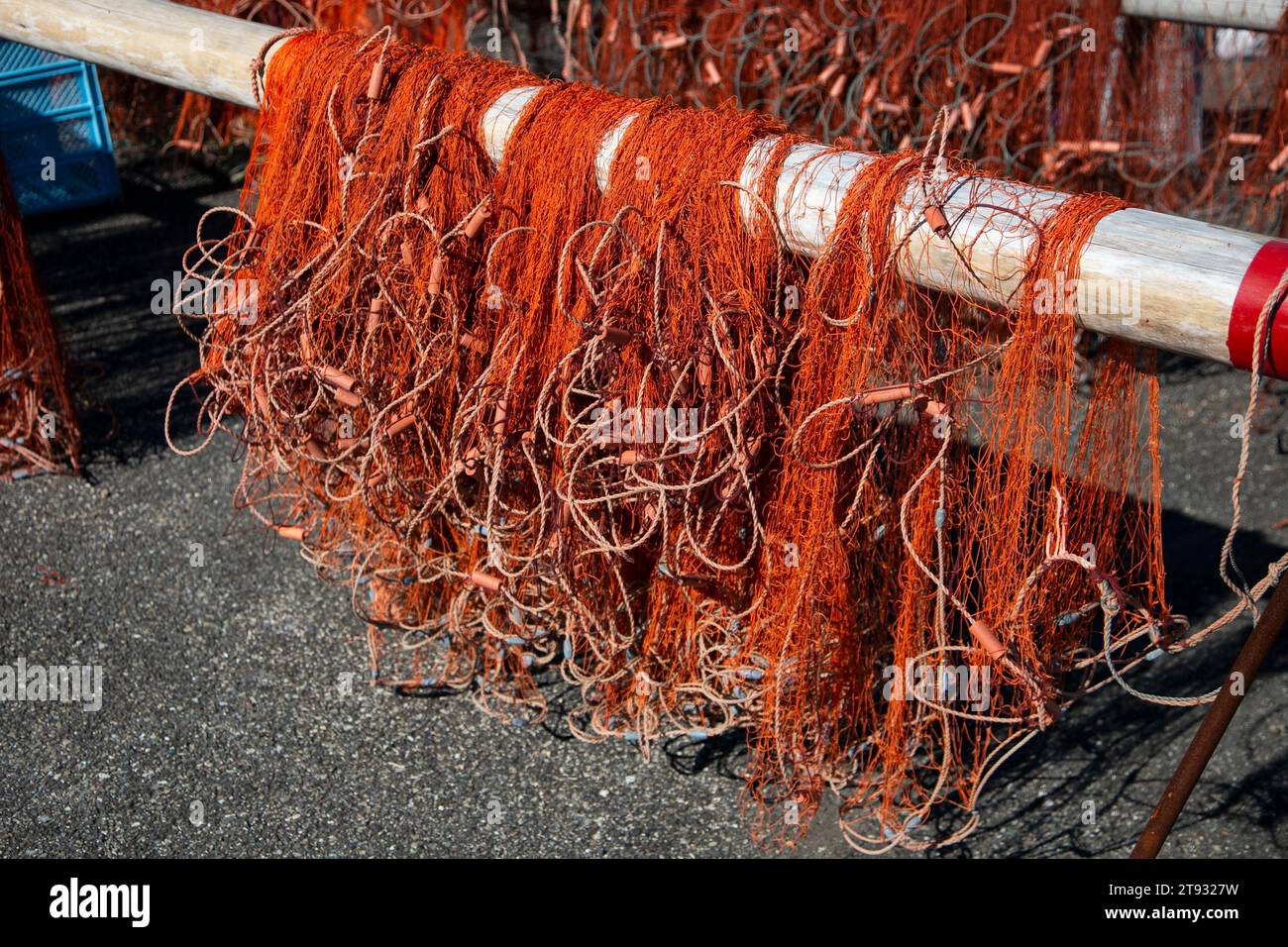 Nachikatsuura, Japan; 1st October 2023: Fishermen mending their fishing ...
