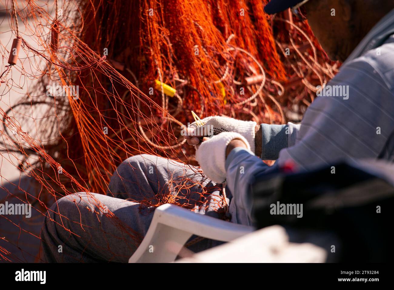 Nachikatsuura, Japan; 1st October 2023: Fishermen mending their fishing ...