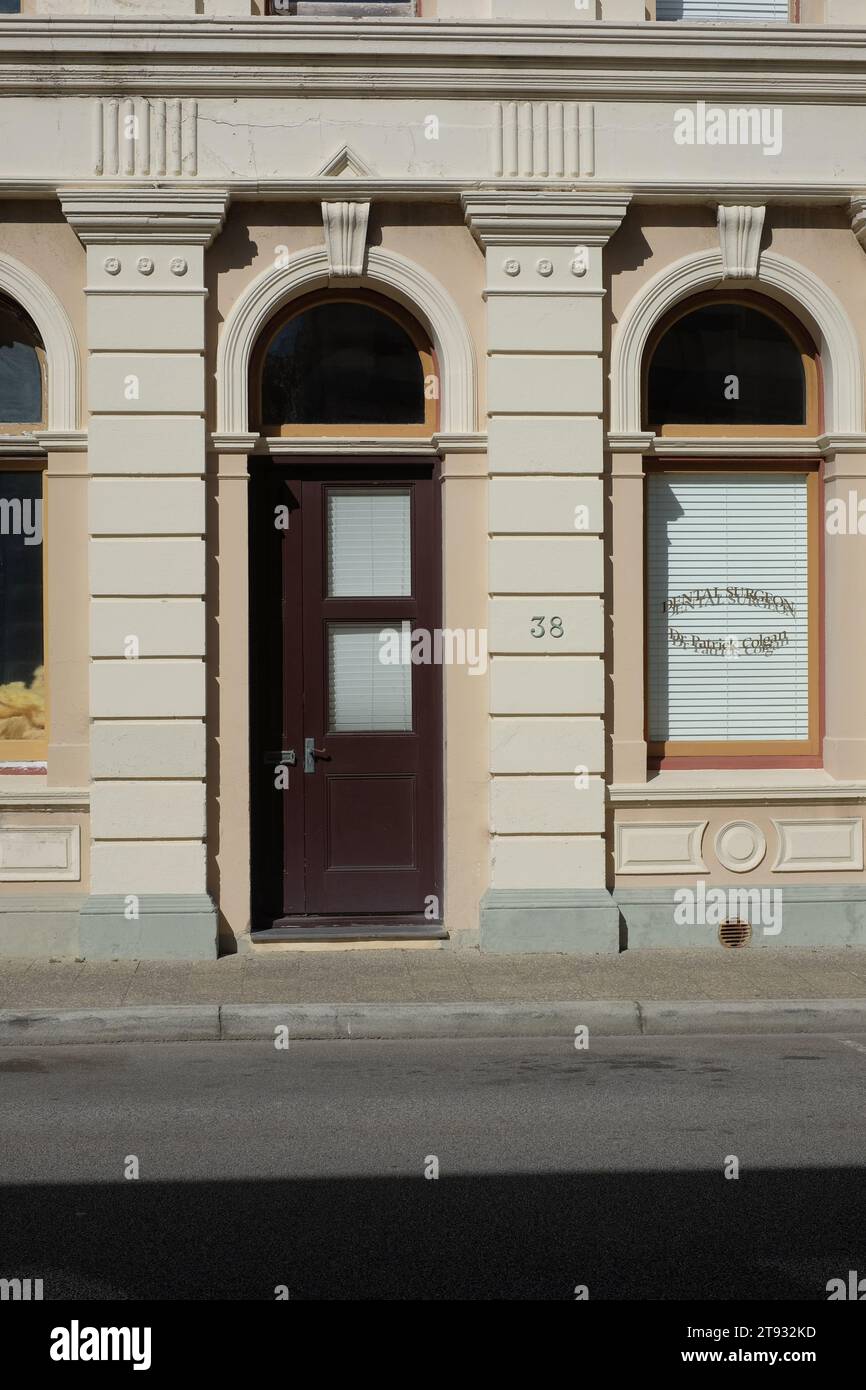 Arched doorway set between pilasters, Lilly's Building. Architectural ...