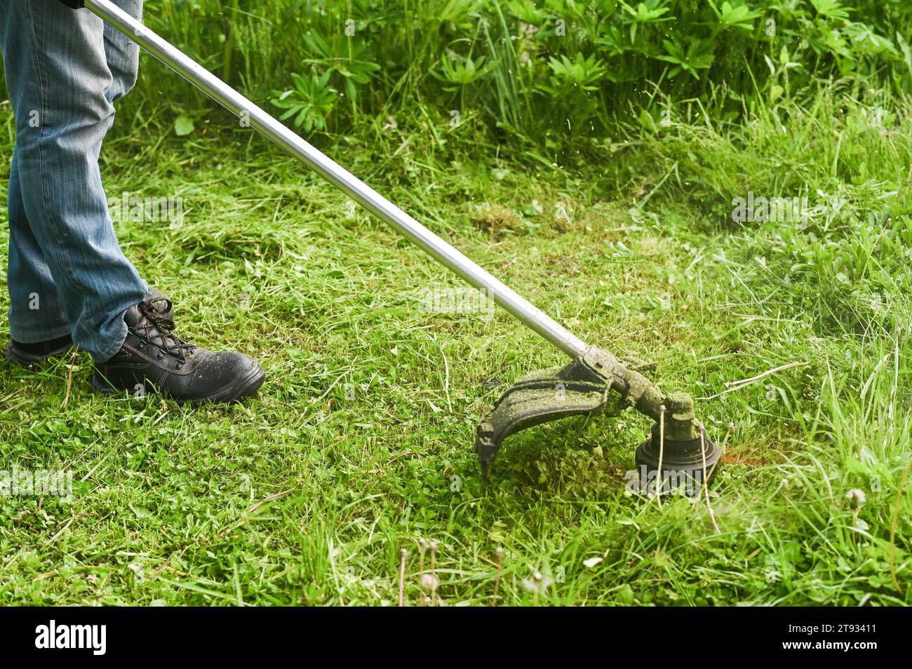 Close up man mows grass hi-res stock photography and images - Alamy