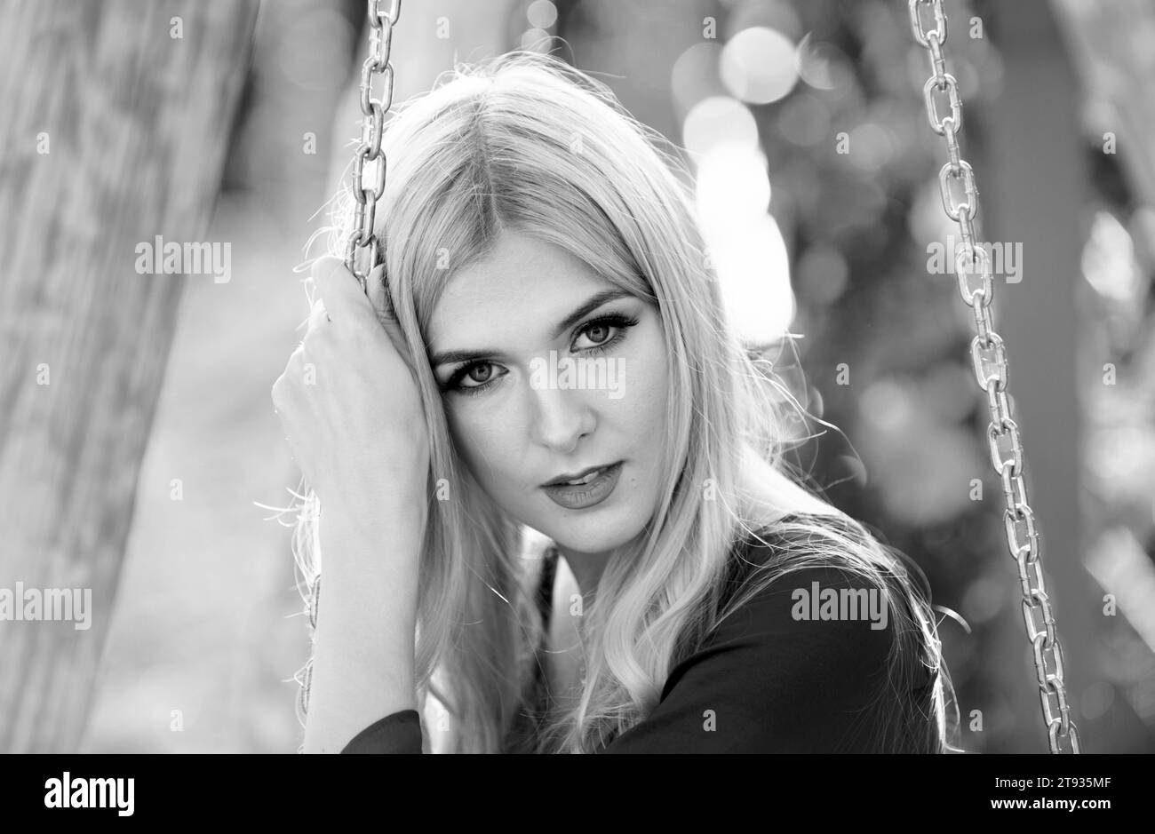 Portrait of beautiful thoughtful pensive woman. Outdoor portrait of a ...