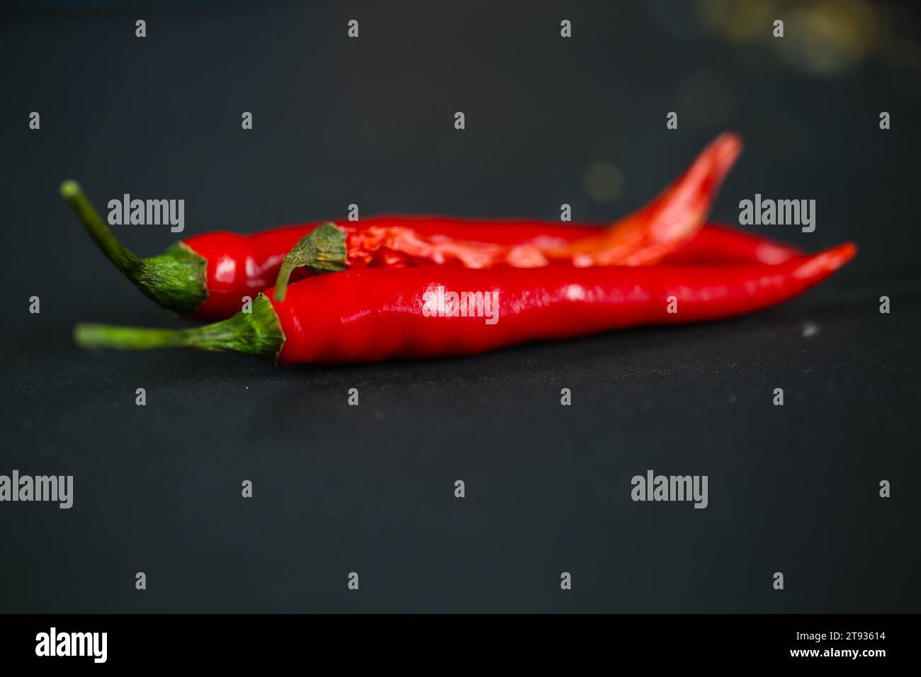 red chilli pod on black background Stock Photo - Alamy