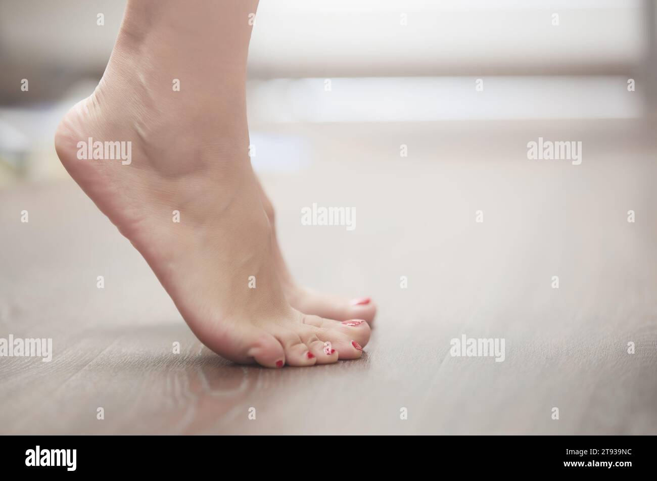 Feet woman standing on tiptoe hi-res stock photography and images - Alamy