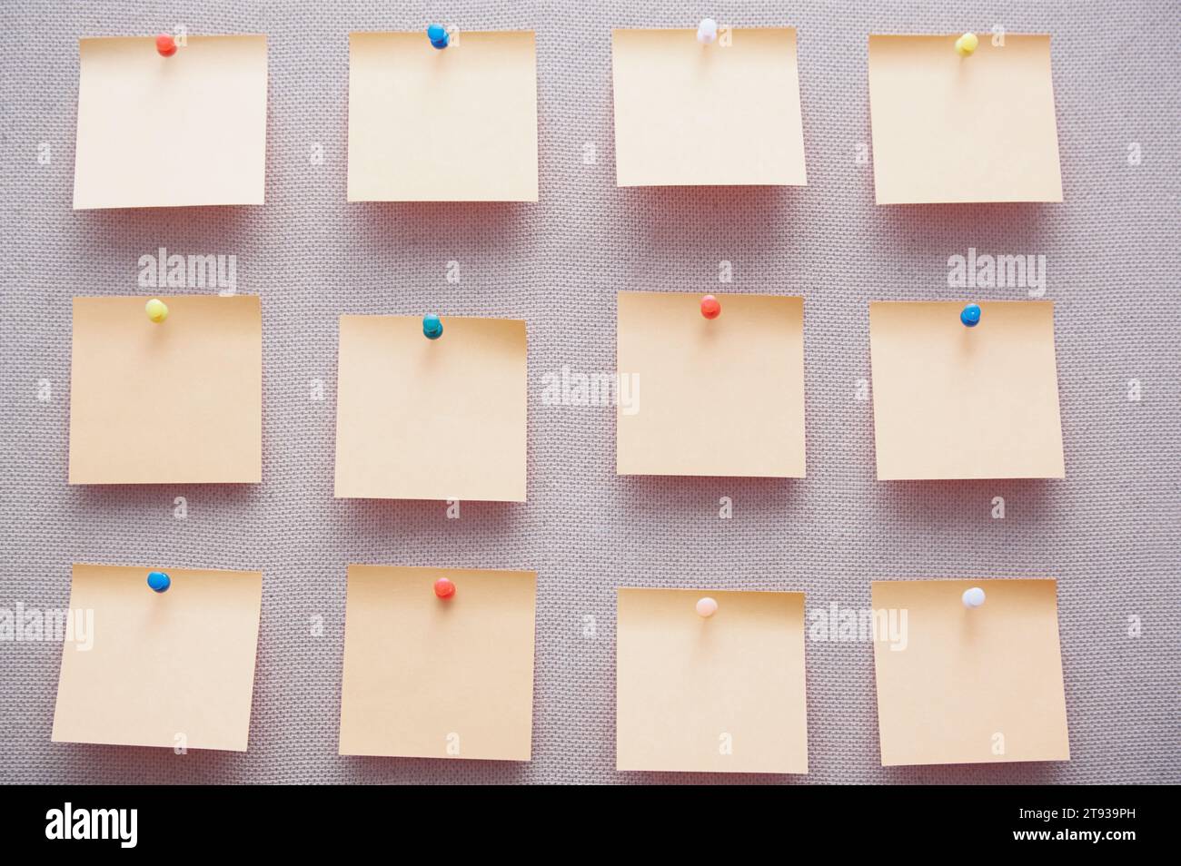 Sticky notes on a bulletin board. Close-up view Stock Photo - Alamy