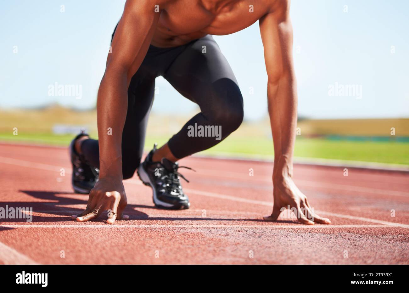 Man, runner and starting line for sprint, athlete and training for ...