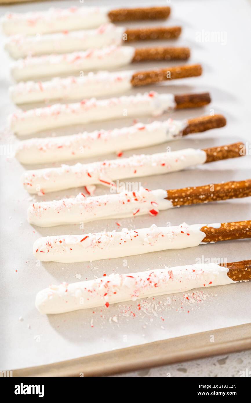 Candy cane chocolate covered pretzel rods Stock Photo - Alamy