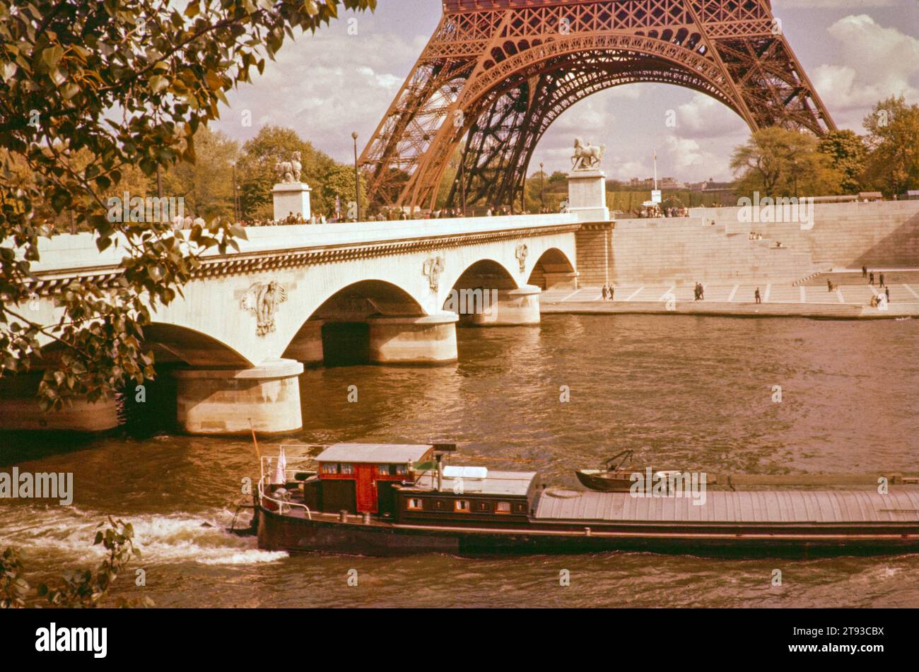 Cargo boat on River Seine with Eiffel Tower in background, Paris ...