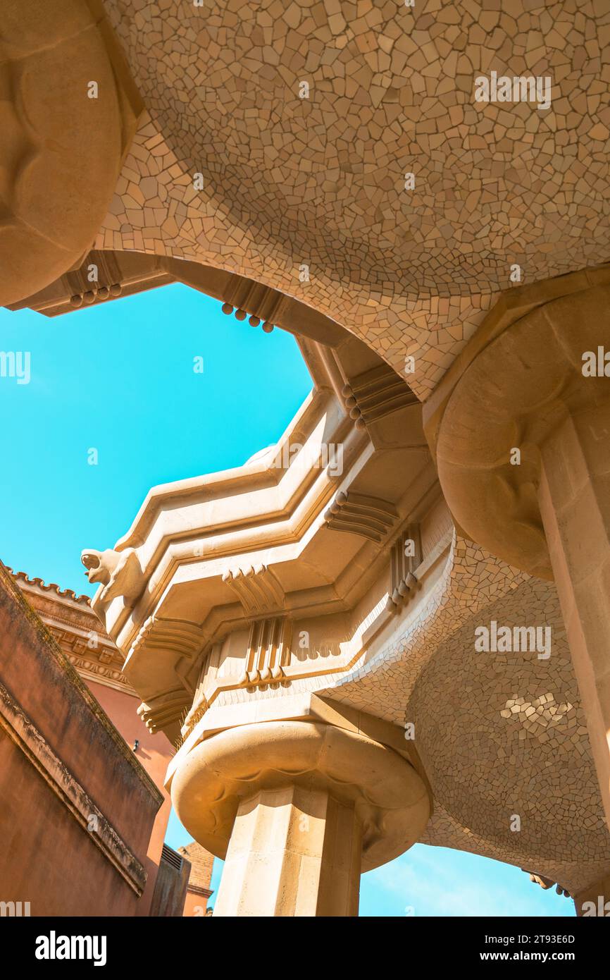 Columns stone aqueduct of a building designed by Gaudi in park Guel in ...
