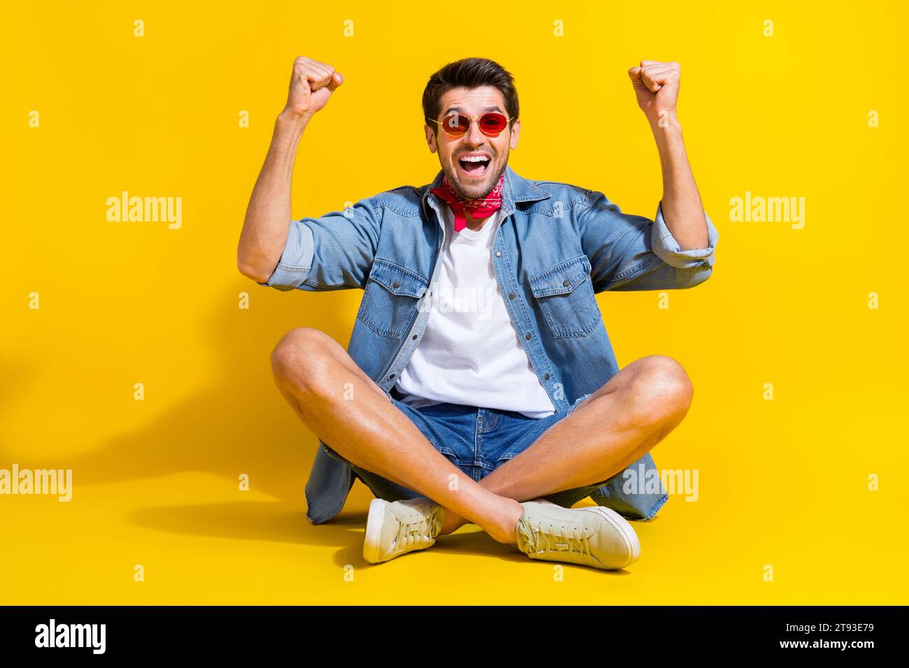 Full size photo of overjoyed guy with bristle wear jeans jacket sit win ...