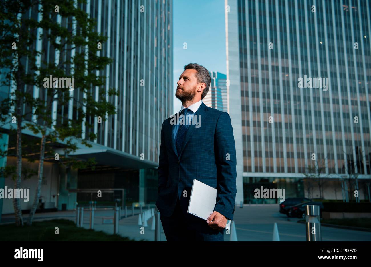 Businessman walking. Manager in a luxury modern open space business ...