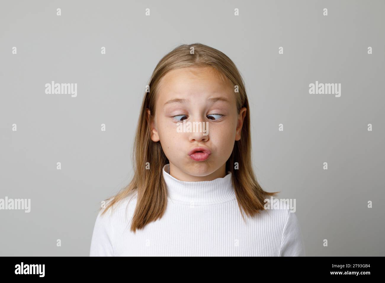 Girl grimacing hi-res stock photography and images - Alamy