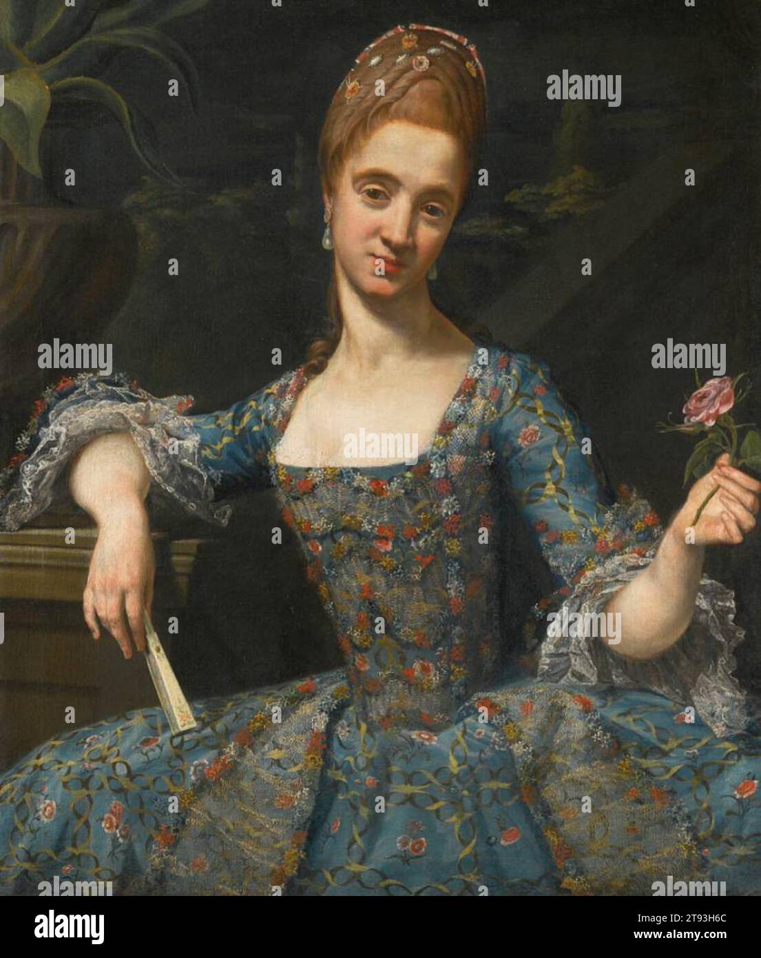 An elaborately embroidered blue dress hi-res stock photography and ...