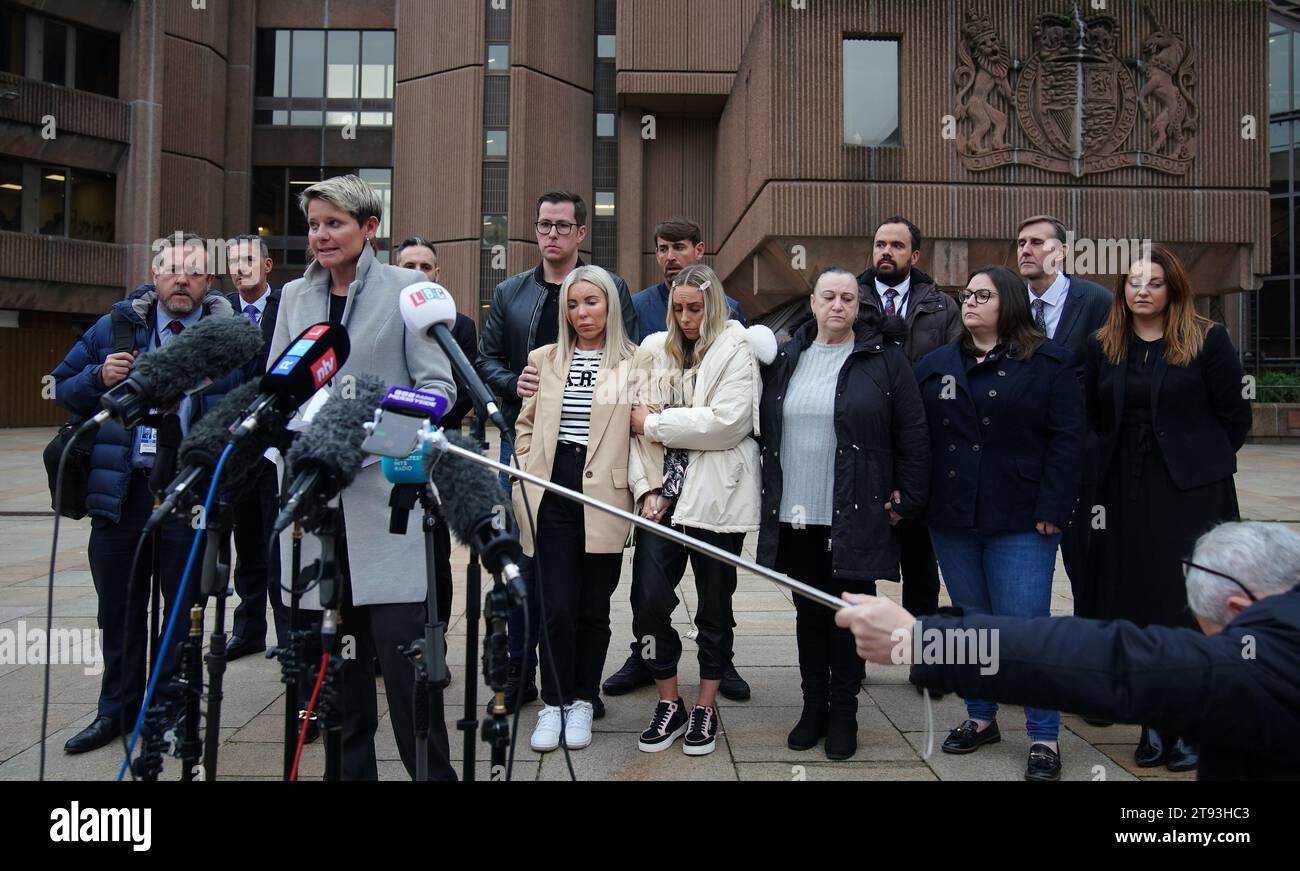 Ashley Dales' mother Julie Dale (centre left) listens as a statement is ...
