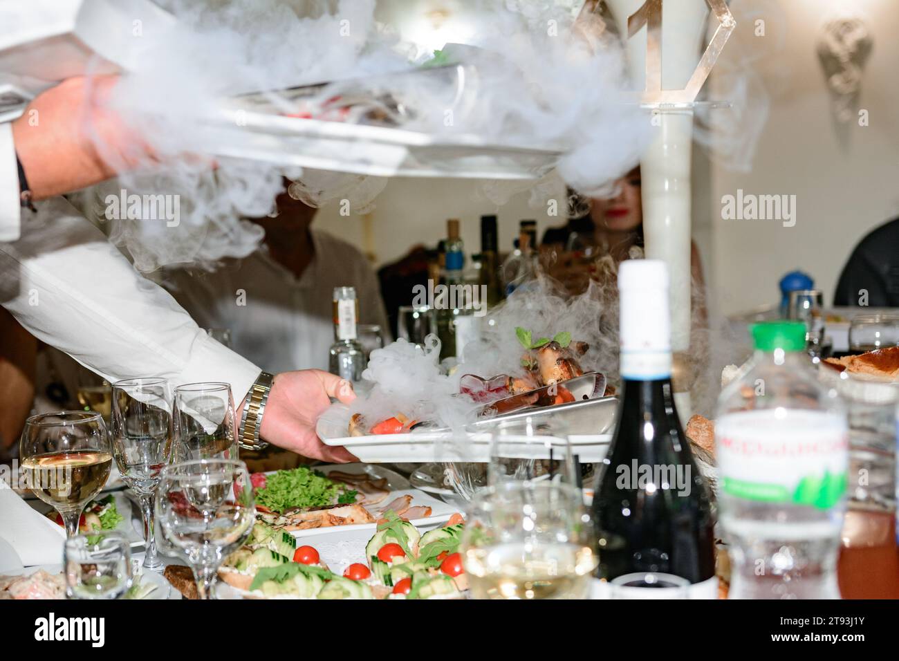 Restaurant white waiters serving food hi-res stock photography and ...