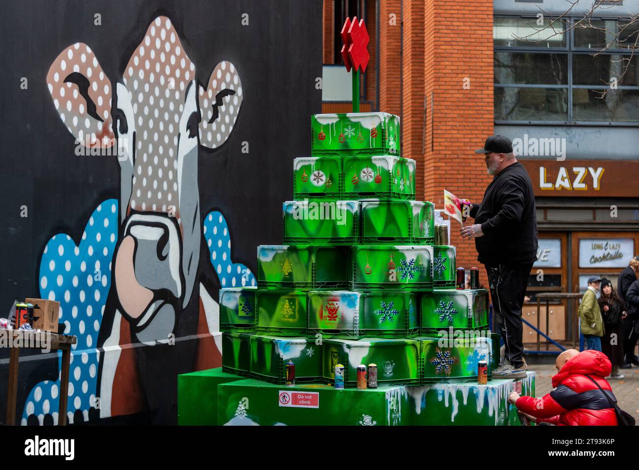 London, UK. 22 November 2023. Graffiti artists at work at the unveiling ...