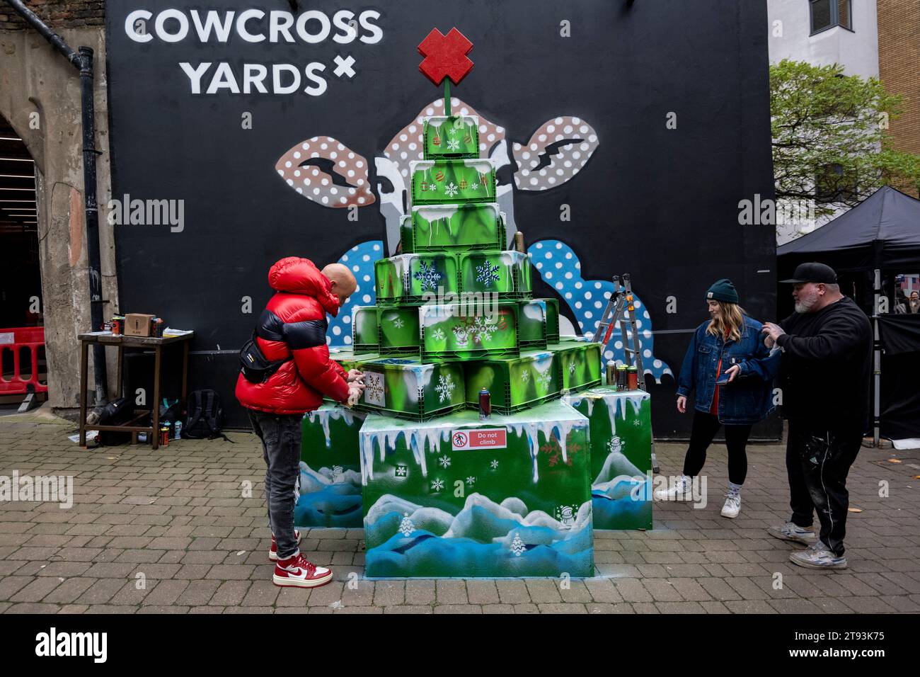 London, UK. 22 November 2023. Graffiti artists at work at the unveiling ...
