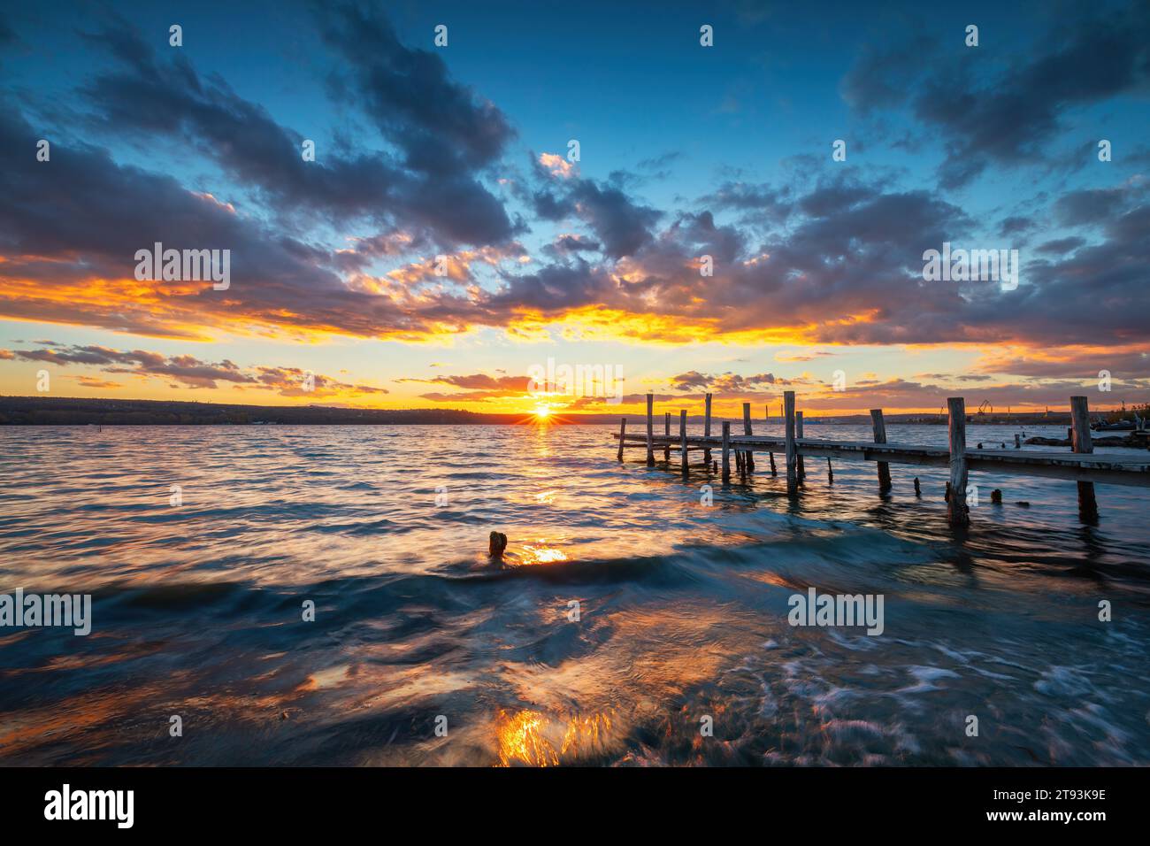 Small Dock at the lake, sunset shot Stock Photo - Alamy
