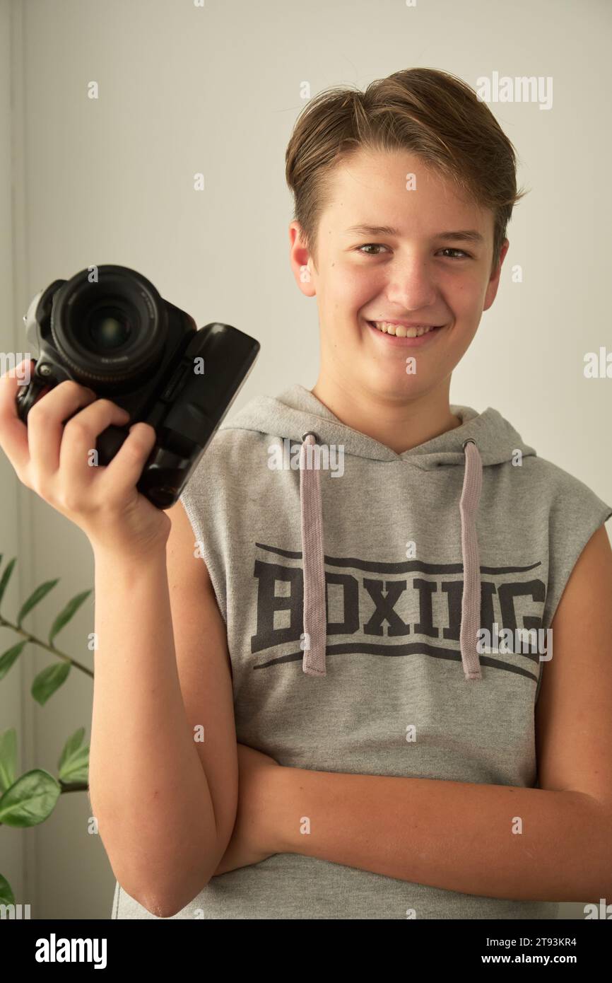 a boy with camera in his hands Stock Photo - Alamy