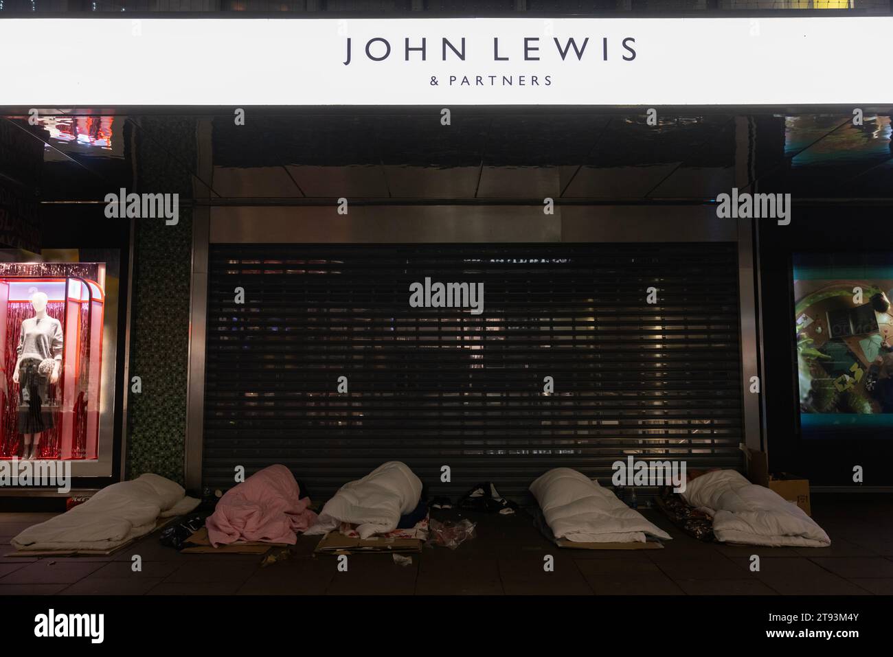 Homeless people sleeping on the pavement outside John Lewis department ...
