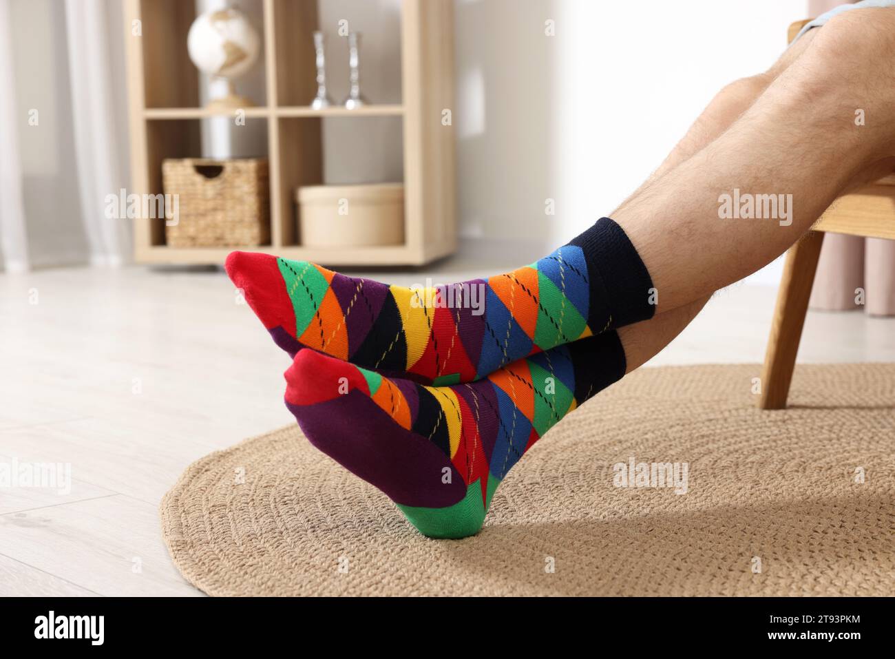 Legs wearing colorful socks in hi-res stock photography and images - Alamy
