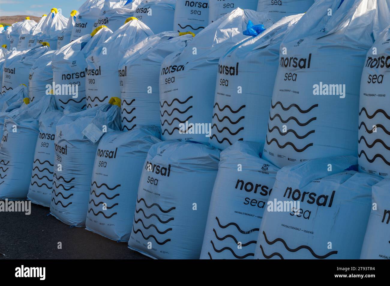 Stacked bags of sea salt on Husavik harbour, Iceland Stock Photo - Alamy
