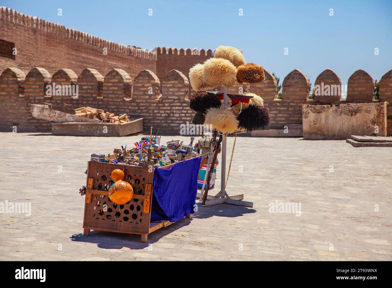 Uzbek traditional clothes such as skullcaps and fur hats and other ...