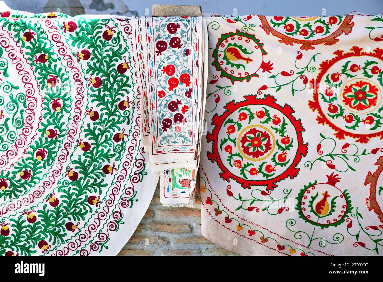 Traditional Uzbek carpets on the wall in a gift shop Stock Photo - Alamy