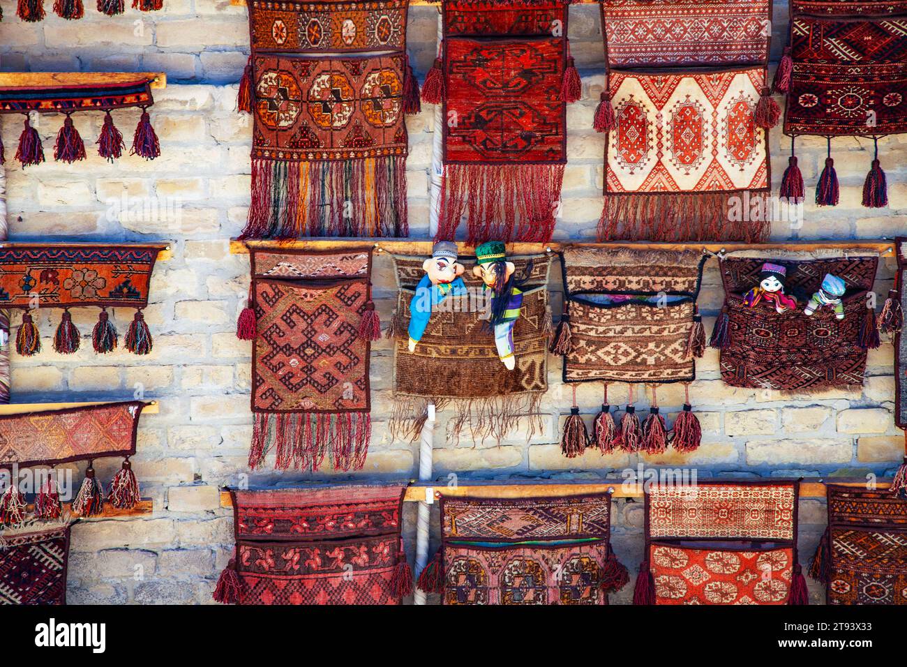 Traditional Uzbek carpets on the wall in a gift shop Stock Photo - Alamy