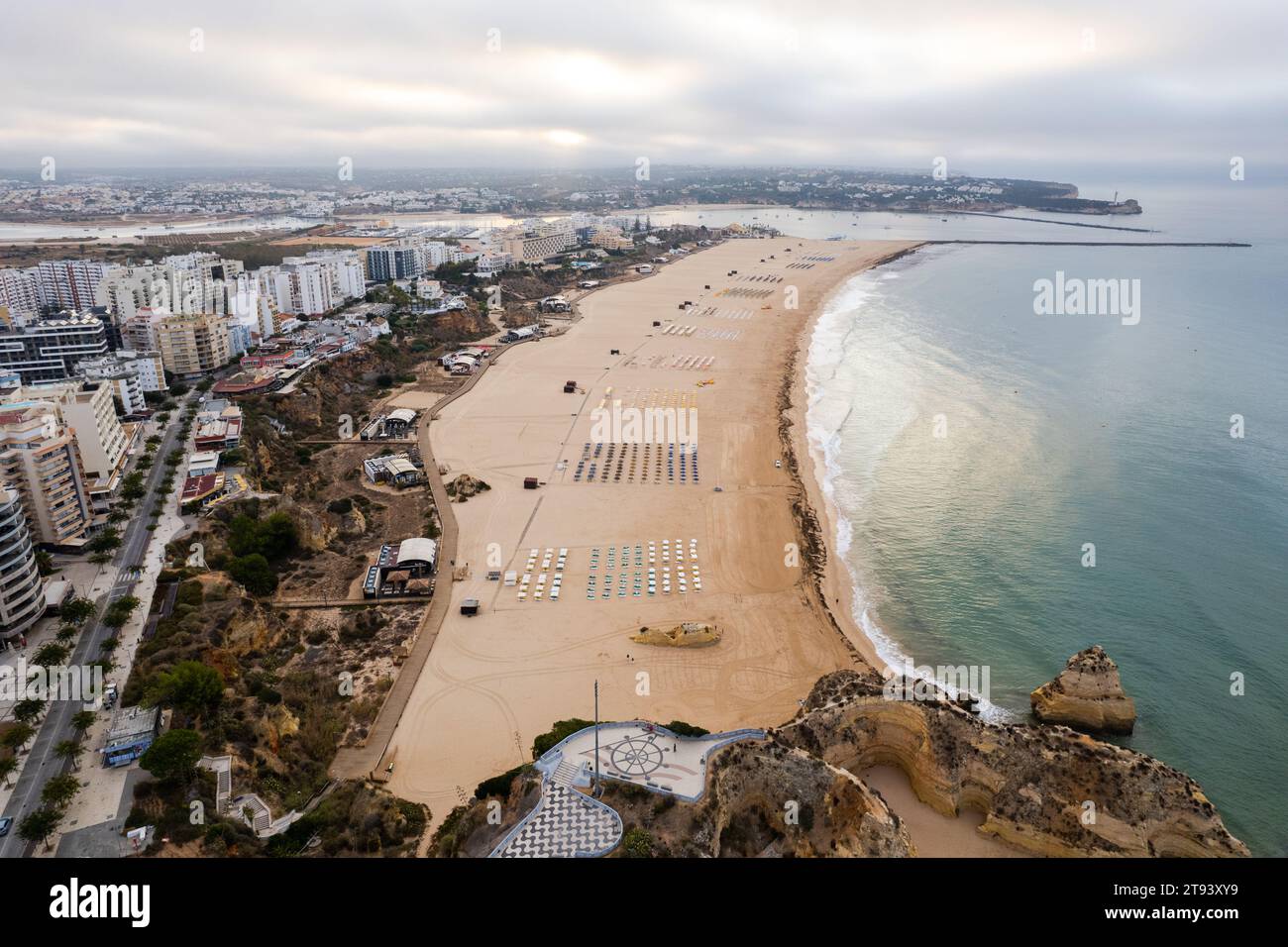 Aerial drone view of Portimao skyline and city beach of Praia da Rocha ...