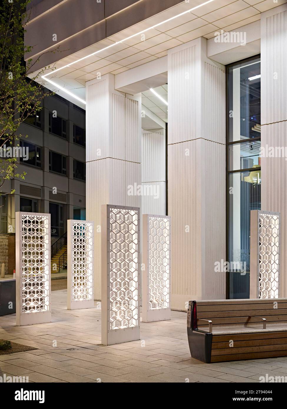 Dusk view towards building entrance. Altus House, Leeds, United Kingdom ...