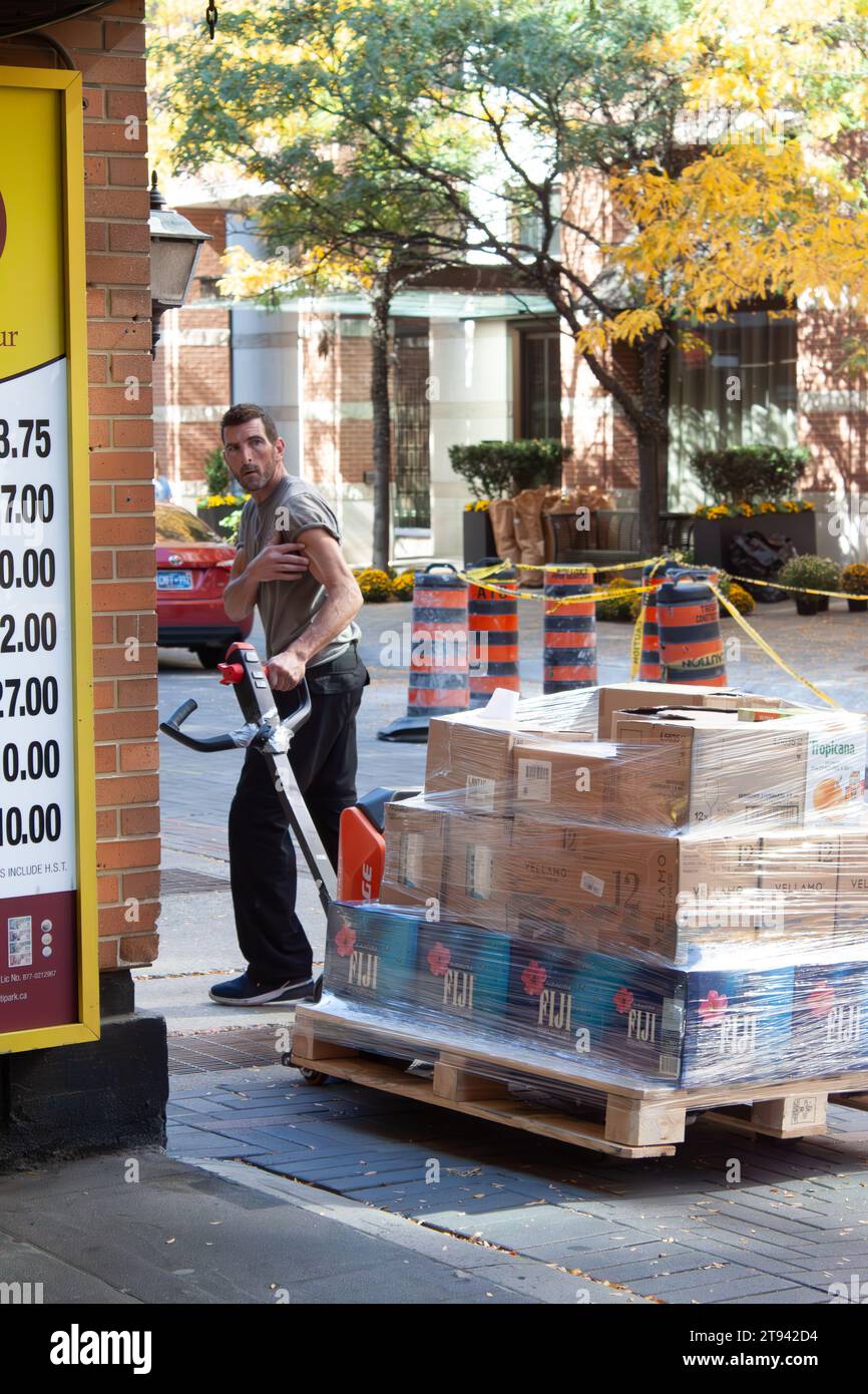 Moving delivery service carrying hi-res stock photography and images ...