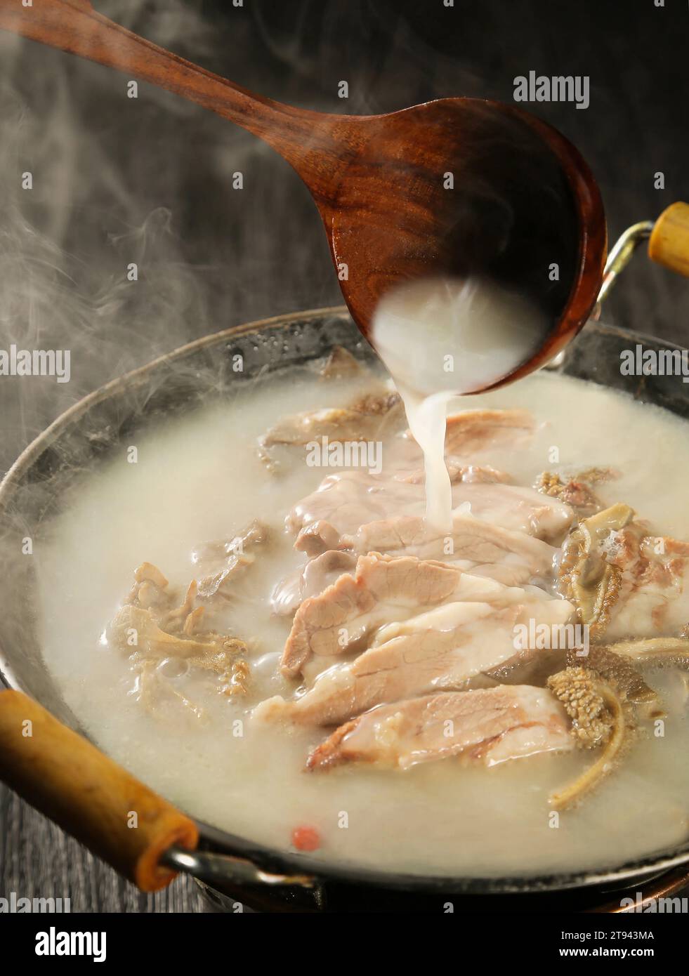 stewed mutton (lamb) with radish soup in casserole Stock Photo - Alamy